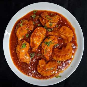These Creamy Butter Chicken Gravy Momos Promise to Make You Drool