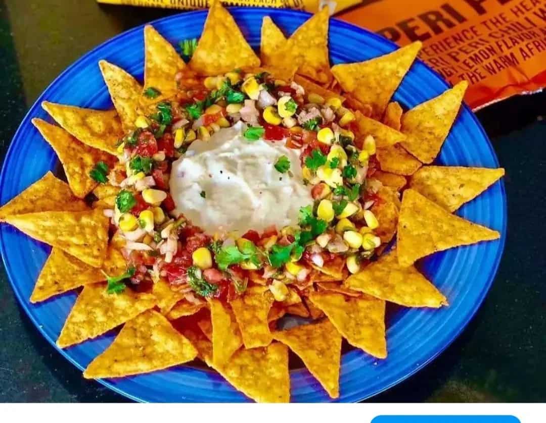 How to make Nachos With White Sauce, Vegetables And Tomato Salsa Recipe