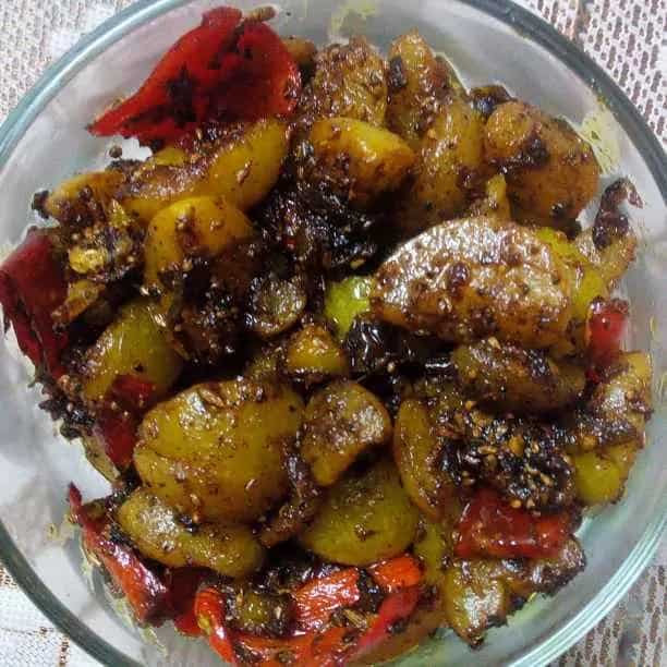 How to make Sweet And Spicy Amla Recipe