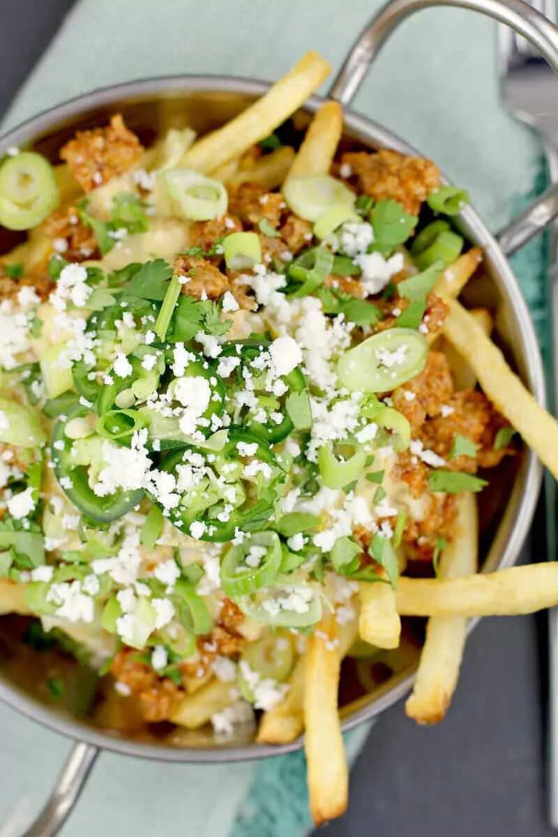 How to make Mexican Poutine With Smoked Cheddar Chile Queso Recipe
