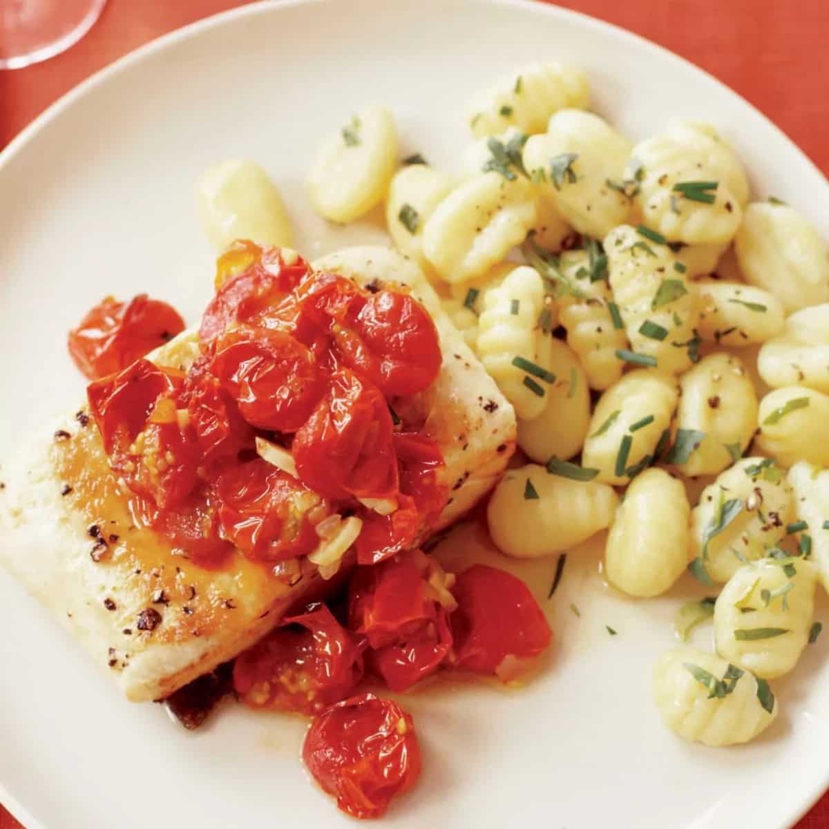 How to make Pan-roasted Fish With Burst Tomatoes And Chive Gnocchi Recipe