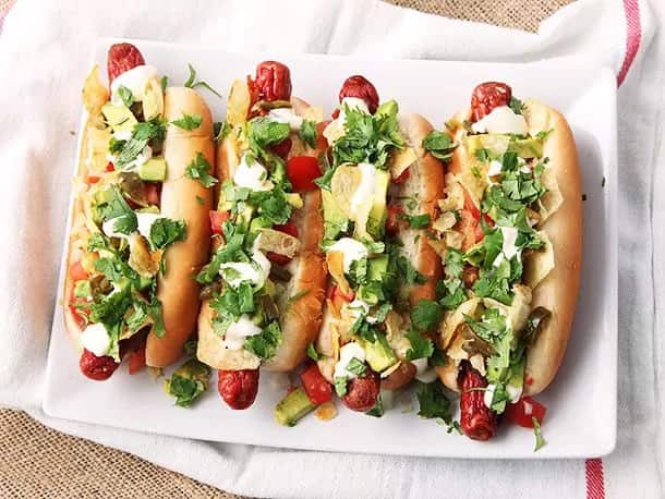 How to make Bacon-wrapped Hot Dogs With Avocado, Tomato, Onion, And ...