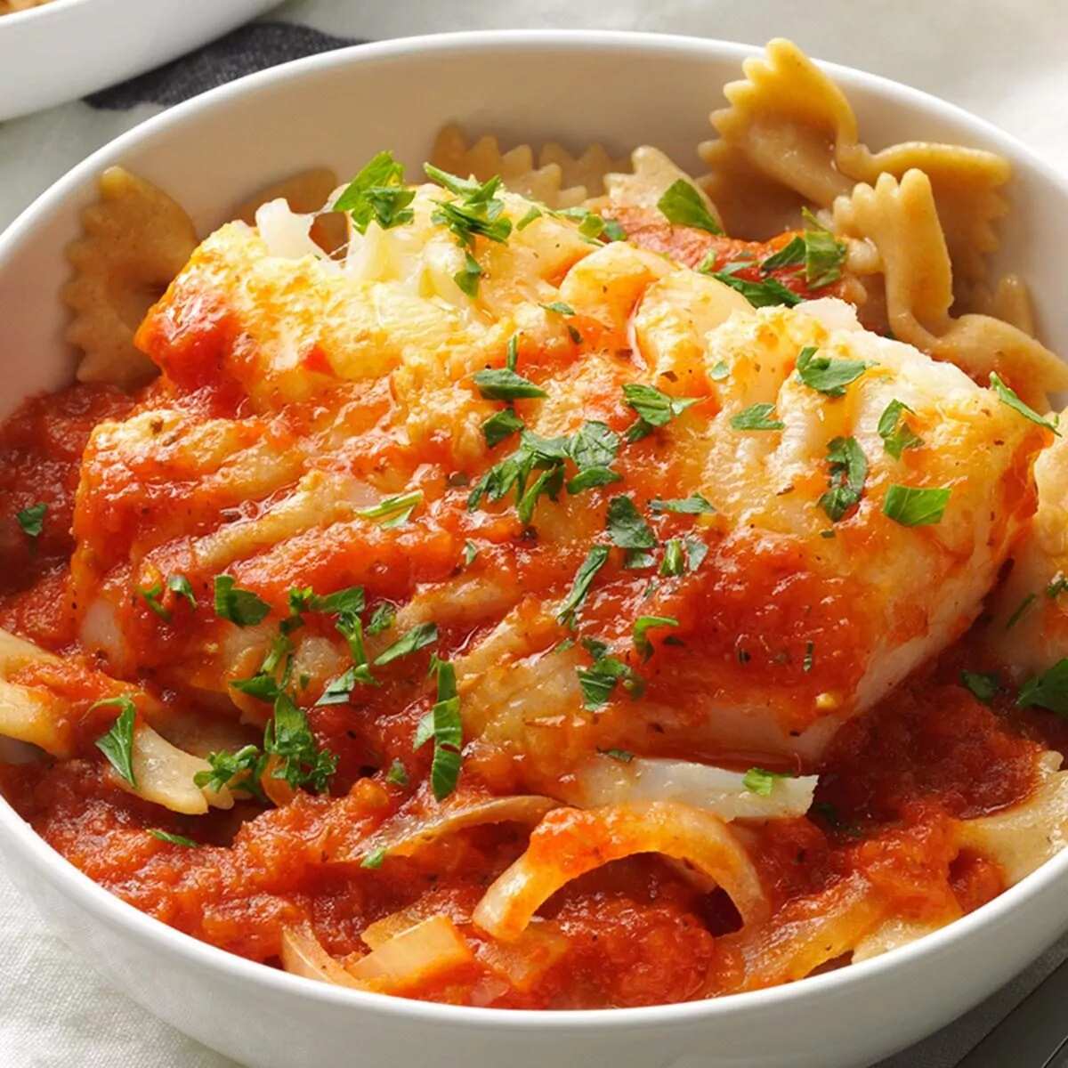 How to make Cod With Hearty Tomato Sauce Recipe