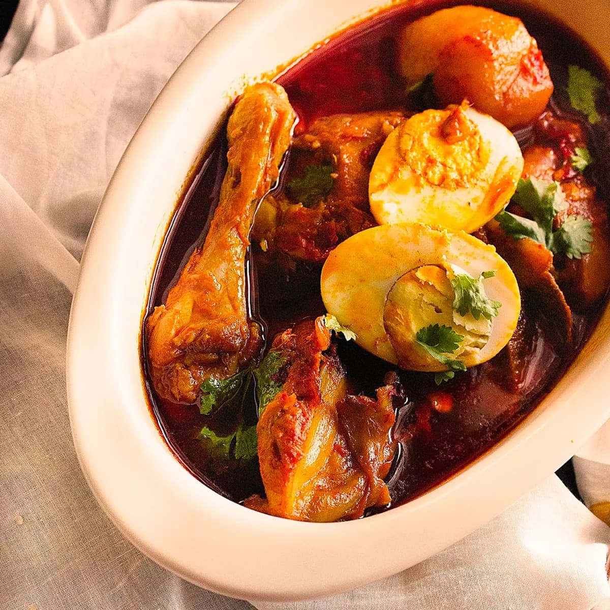 How to make Murgir Laal Jhol Recipe